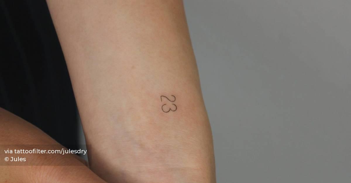 Tattoo of the number "23" located on the wrist.