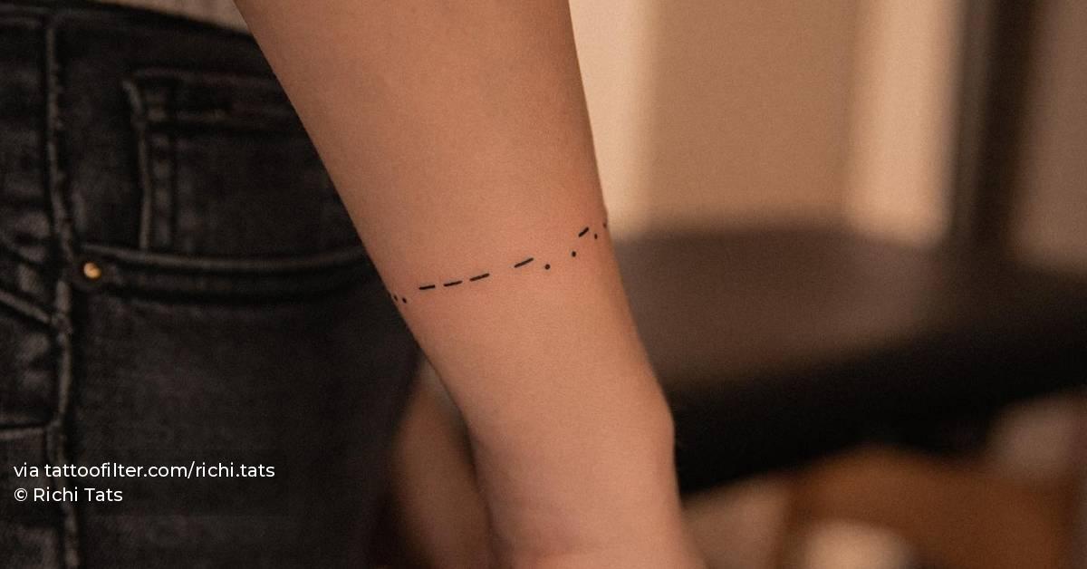Morse code tattoo located on the wrist, minimalistic