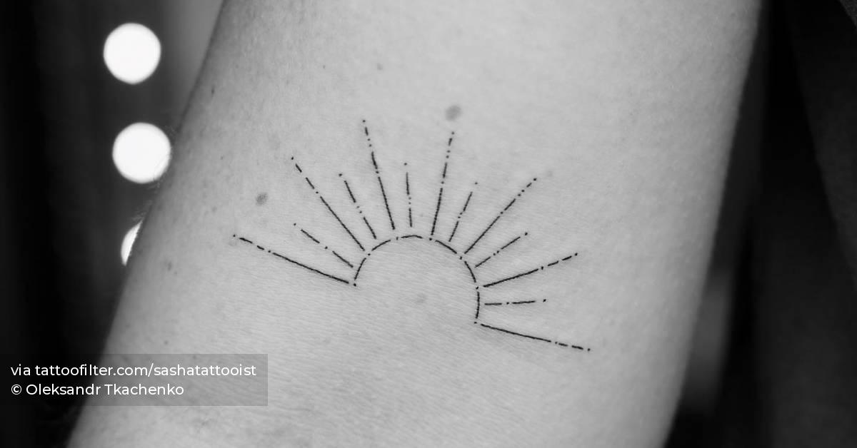 Fine line sunset tattoo done on the bicep.