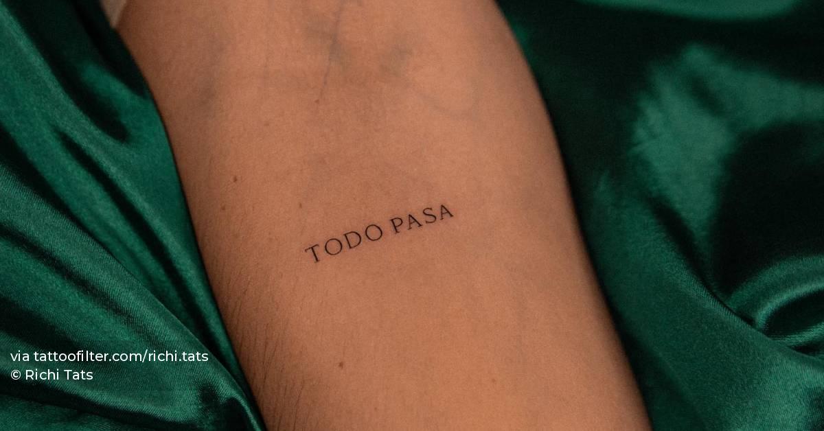 Tattoo that says "todo pasa" located on the inner