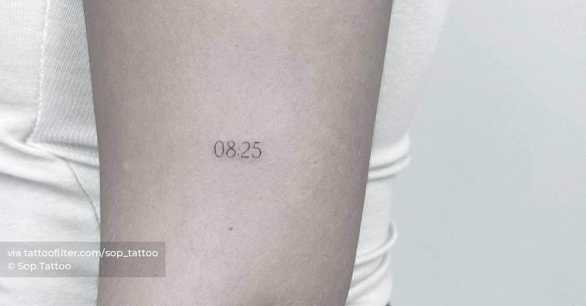 Hour tattoo located on the upper arm.