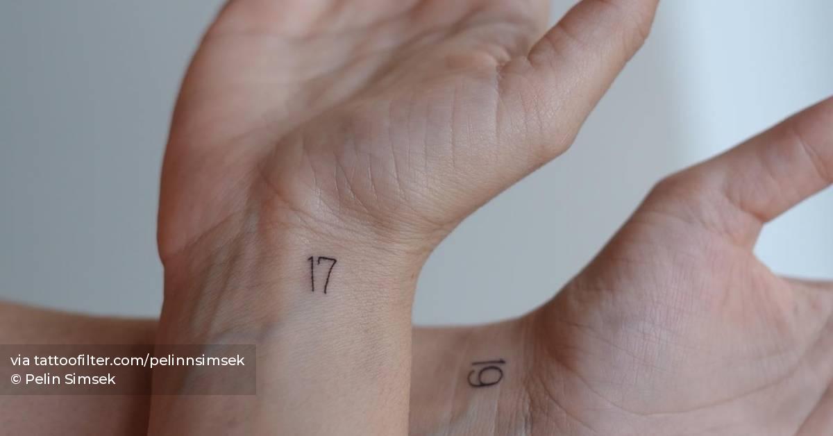 Individual matching numbers "19" and "17" tattooed on