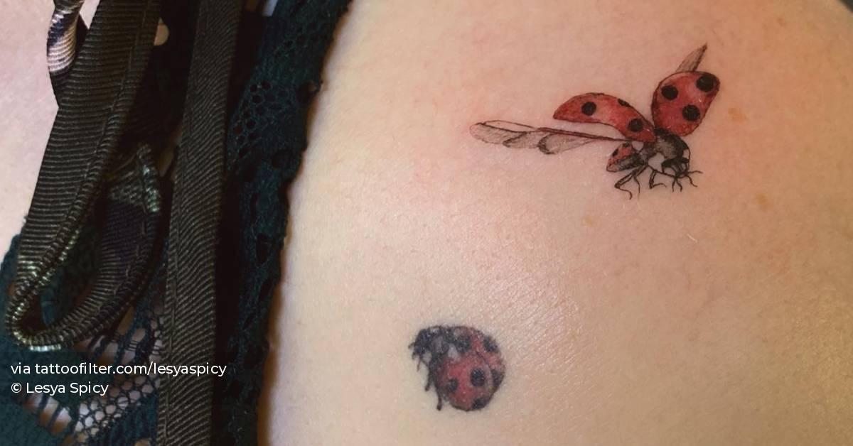 Ladybugs tattooed on the shoulder, one fresh one