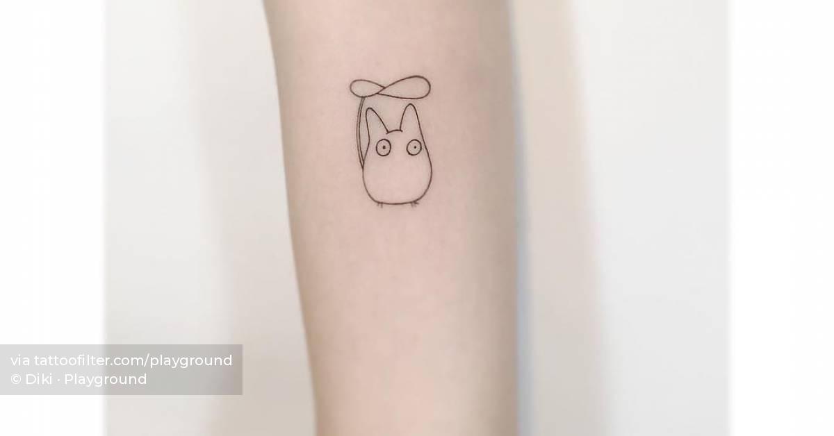 Minimalistic style Chibi Totoro tattoo placed on the