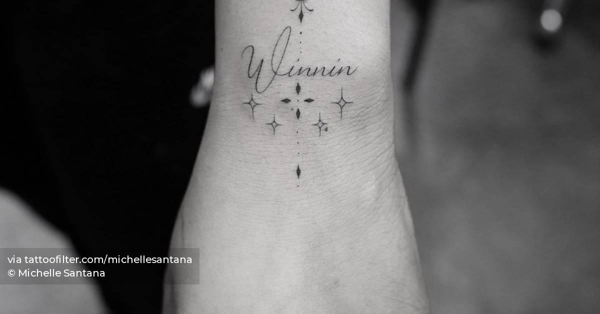"Winnin" lettering tattoo located on Billy B's wrist.