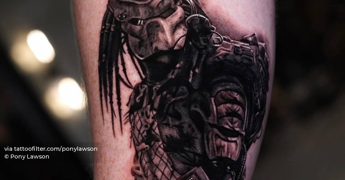 Micro-realistic style Predator tattoo located on the