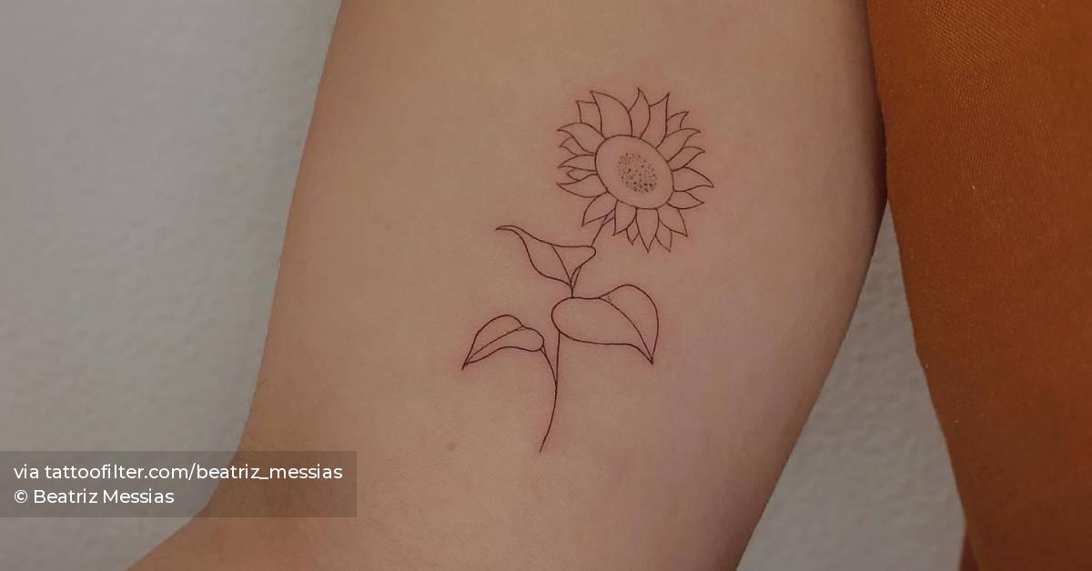 Fine line style sunflower tattoo located on the inner