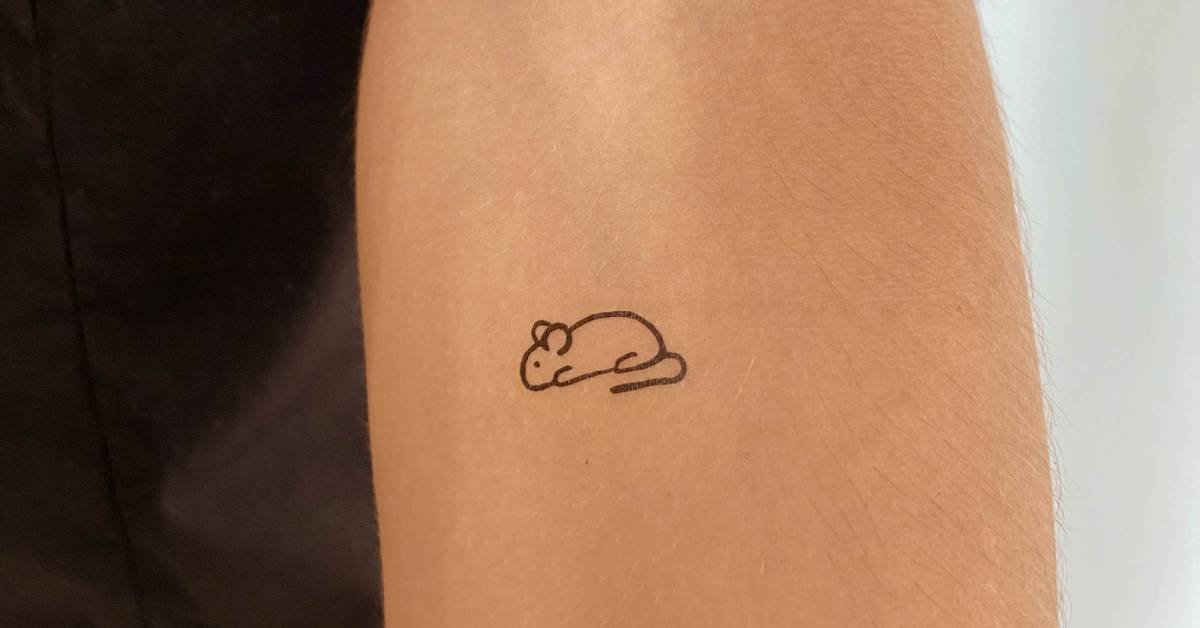 Minimalistic mouse temporary tattoo placed on the inner