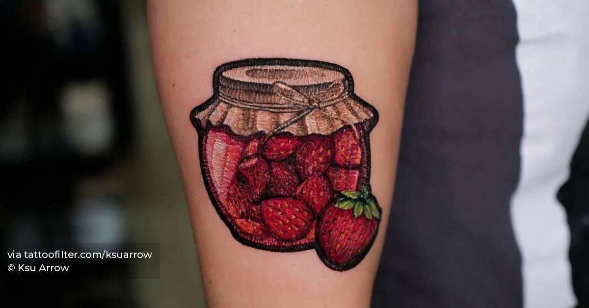 Strawberry jam tattooed on the upper arm, embroidery