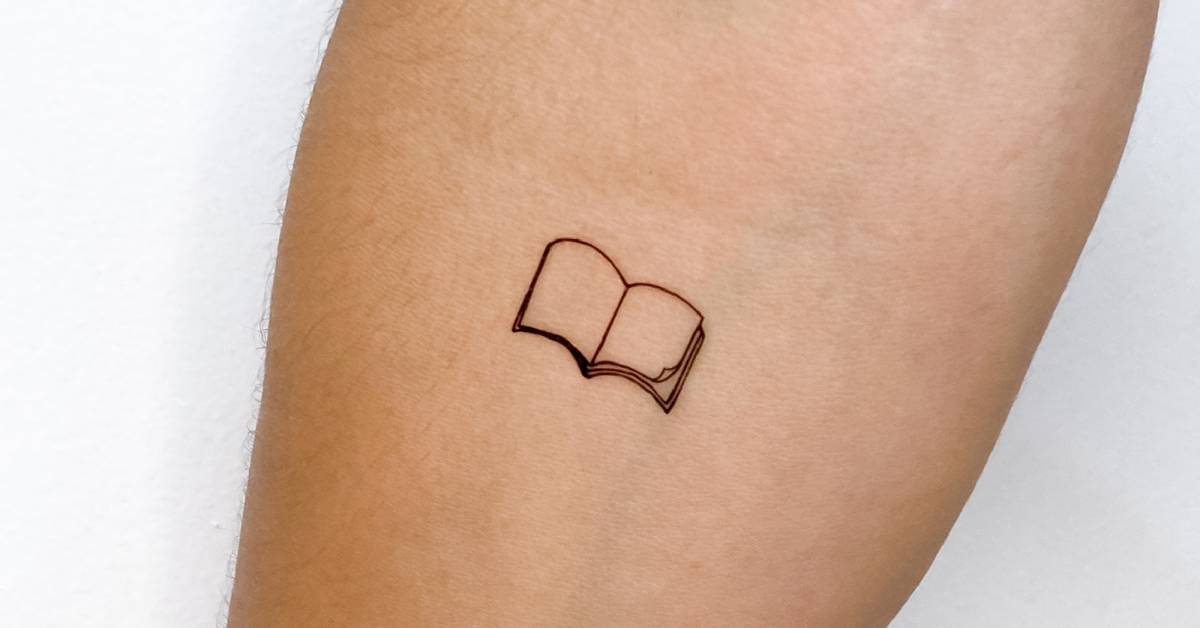 Minimalist book temporary tattoo placed on the inner
