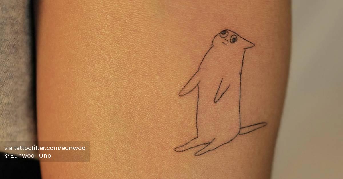 Ignorant style cat tattoo located on the inner forearm.