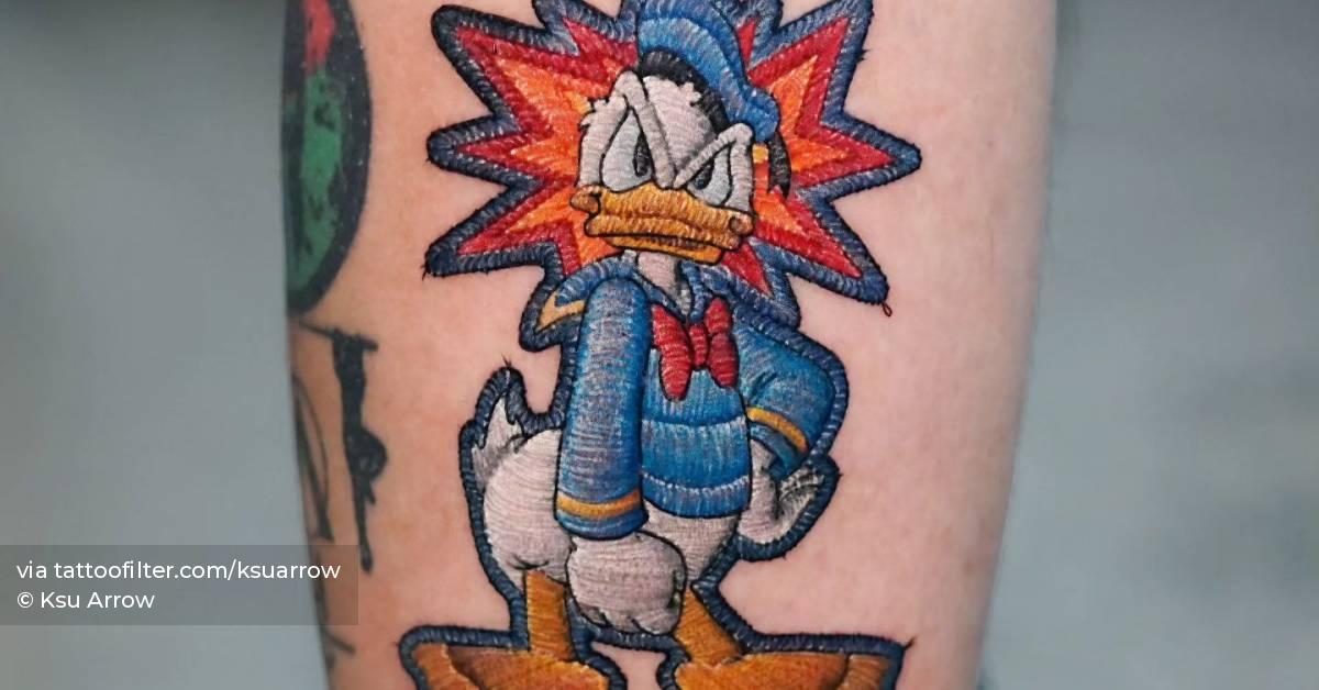 Embroidery style Donald Duck patch tattoo located on