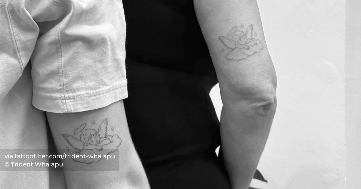 Matching cherub tattoo for best friends, fine line