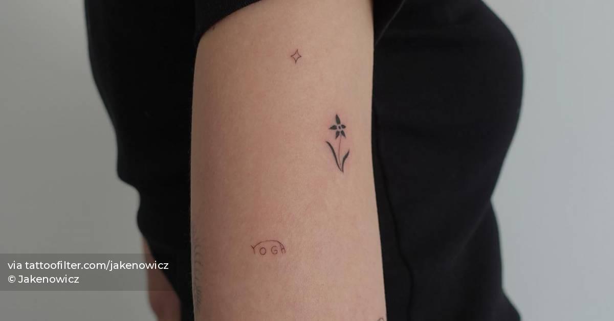 Upper arm composition tattoos, minimalistic style.