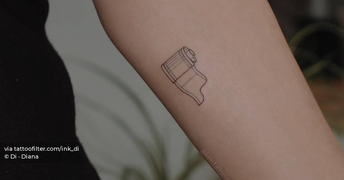 Fine line photographic film tattoo located on the inner