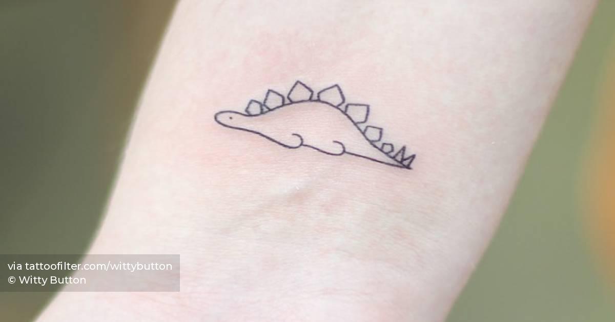 Minimalistic style stegosaurus tattoo located on the