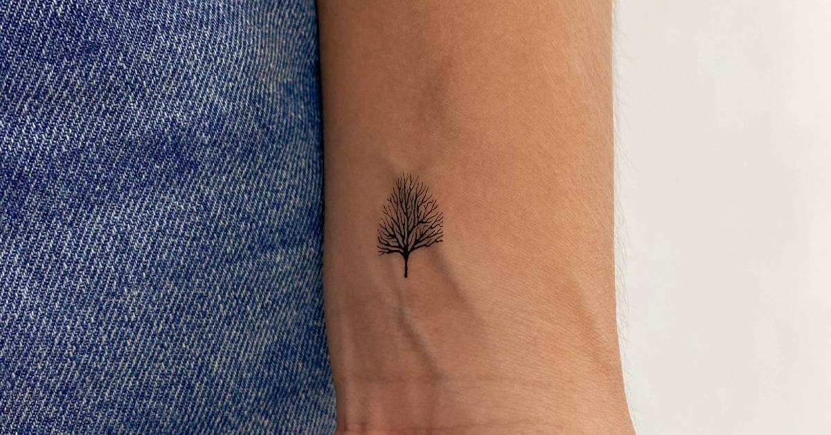 Small leafless tree temporary tattoo placed on the