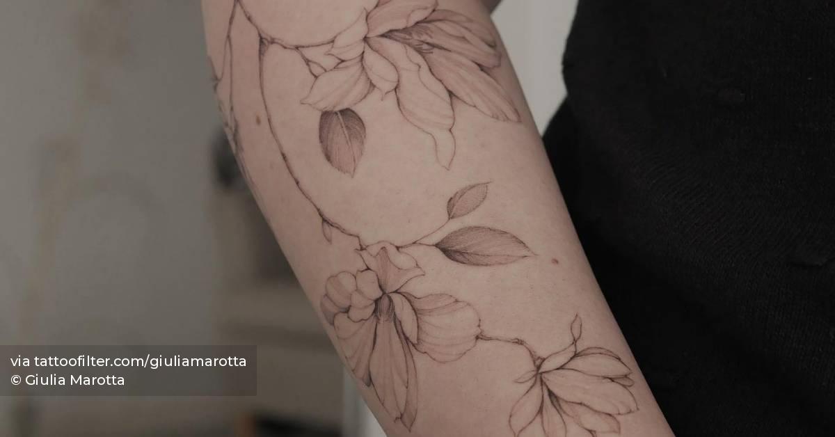Magnolias tattoo placed on the forearm, illustrative