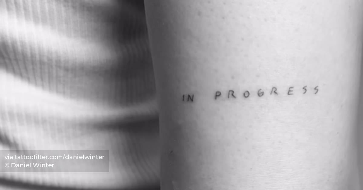 "In progress" lettering tattoo located on Sophia Bush's