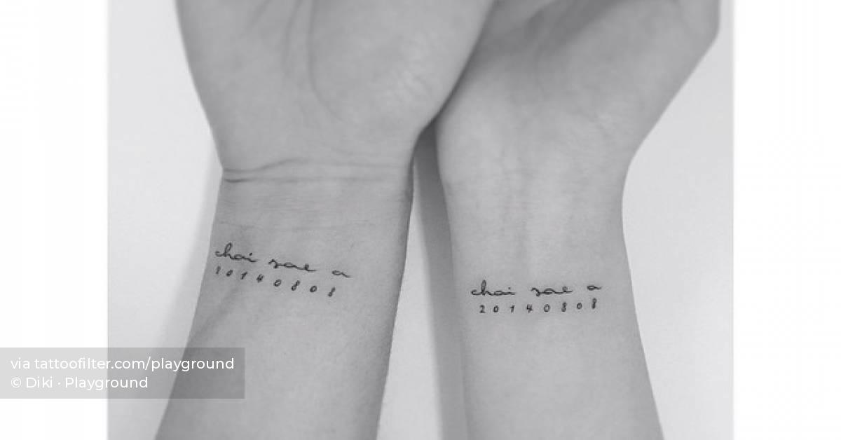Matching name and dates tattoo for couple.