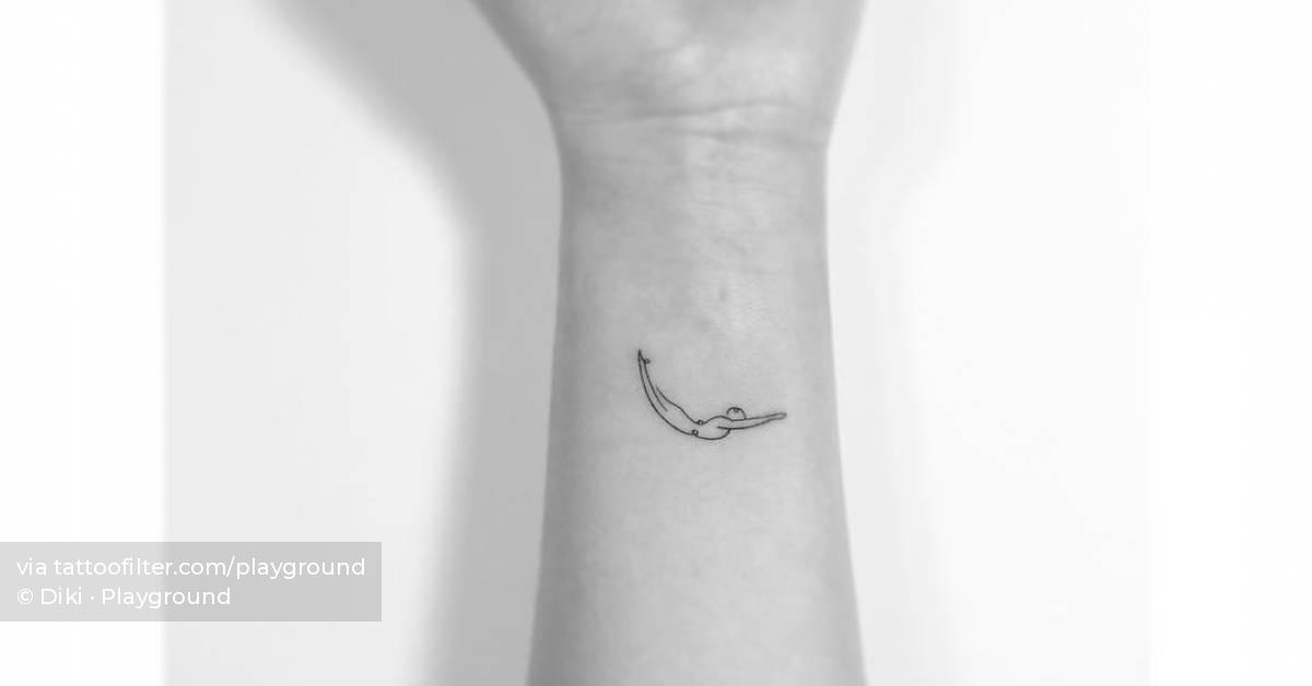 Fine line style high diving tattoo located on the