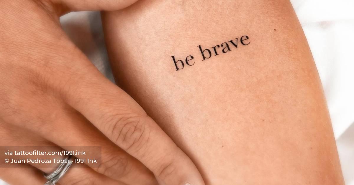 "Be brave" lettering tattoo located on the inner