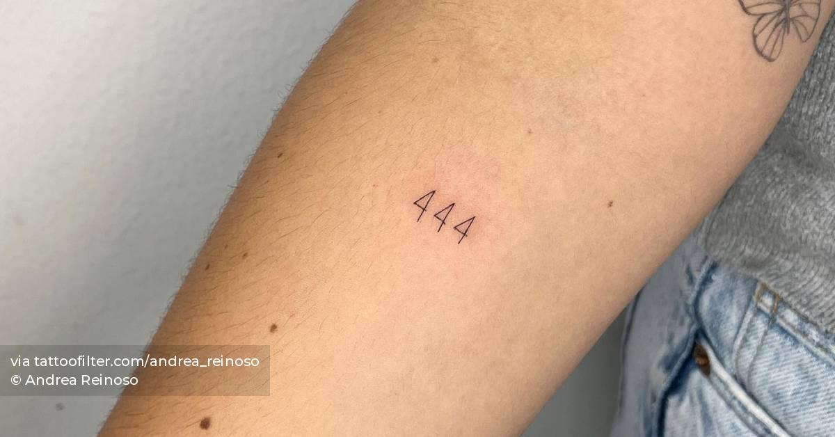 Angel number "444" tattoo located on the inner forearm.