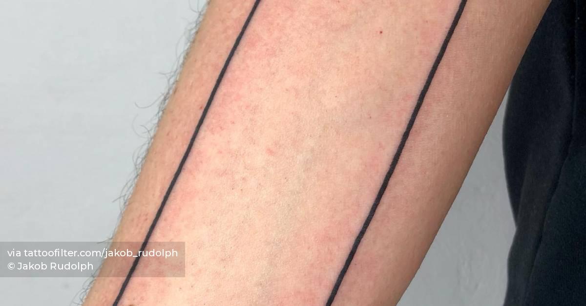 Minimalistic style rectangle tattoo located on the