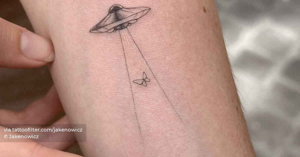 Single needle alien abduction tattooed on the inner