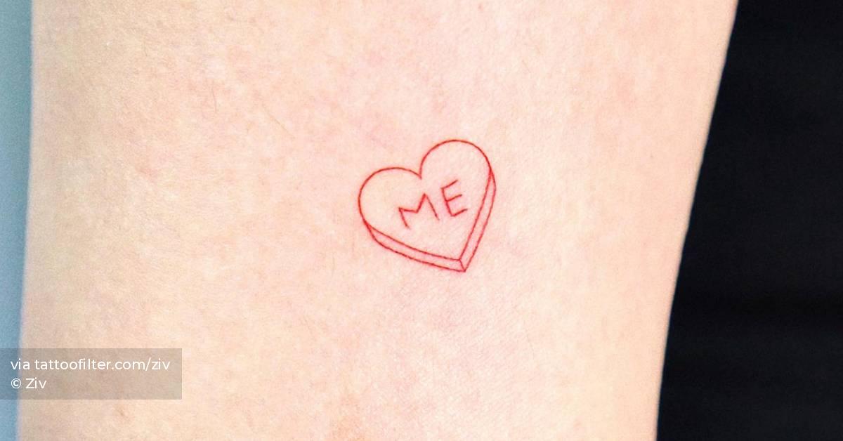 Minimalistic sweetheart and word "me" tattoo located on