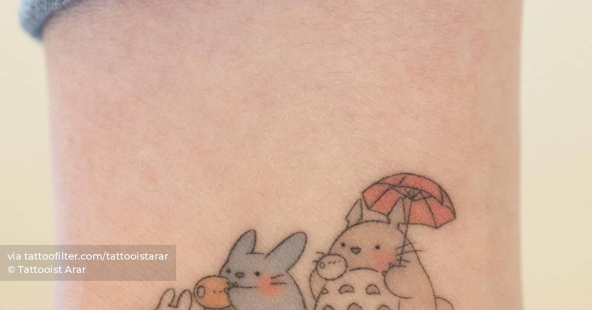 Cute cartoon style Totoro tattoo placed on the ankle.
