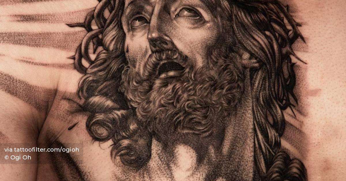 Jesus portrait tattoo located on the chest, done in