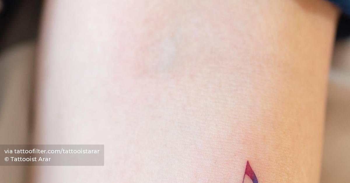 Minimalistic style spectrum quaver tattoo located on