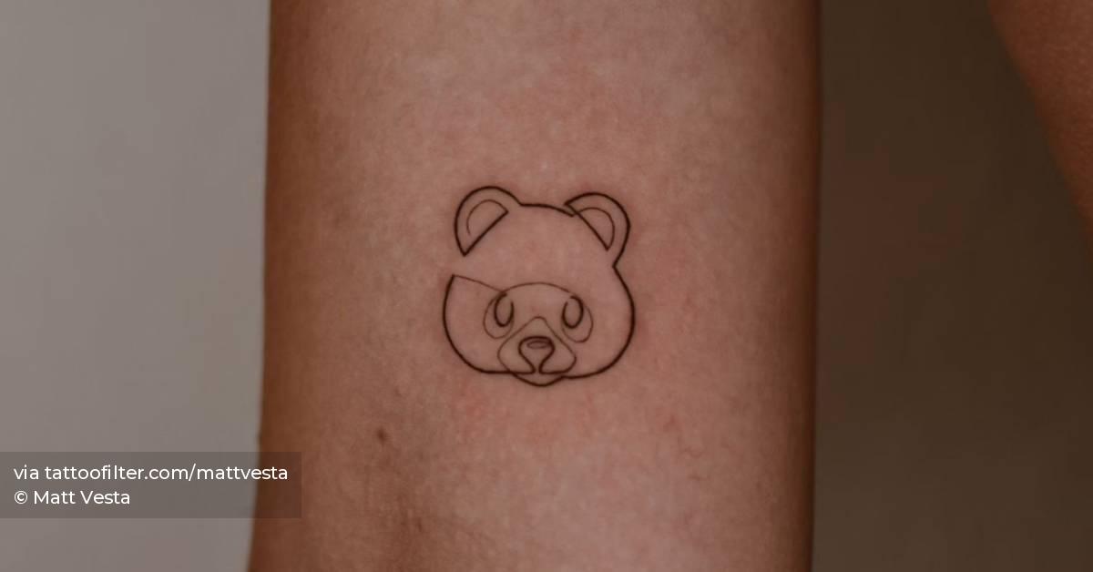 One line bear portrai tattoo located on the inner arm.