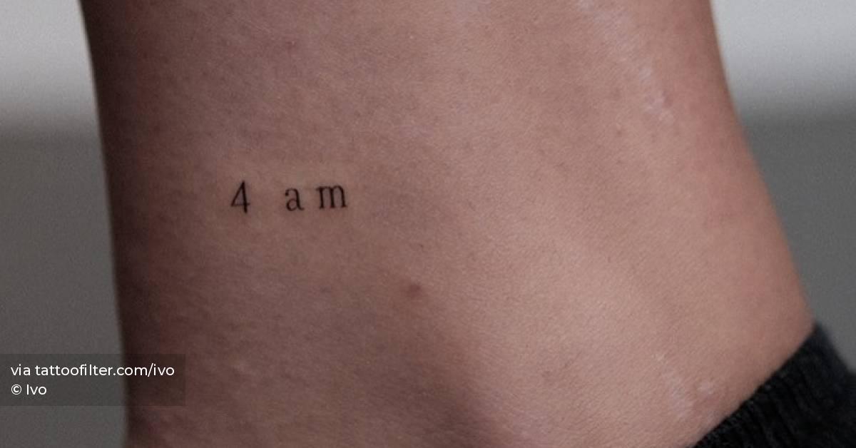 "4 am" lettering tattoo located on the ankle.