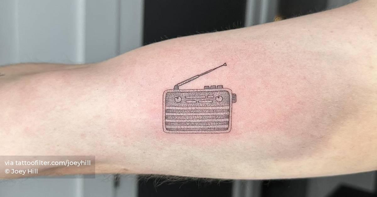Radio tattoo located on the inner arm, illustrative
