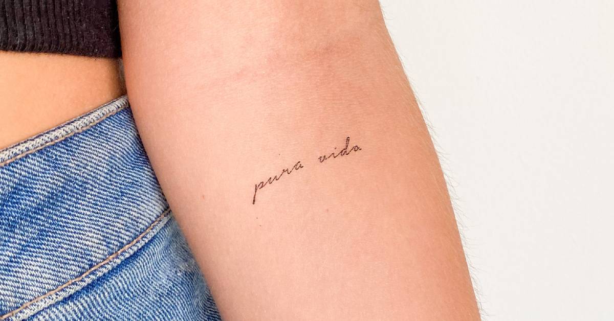 "Pura Vida" temporary lettering tattoo done on the