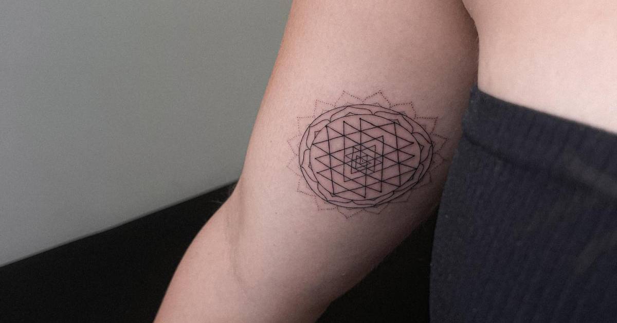 Sri Yantra tattoo located on the inner arm.