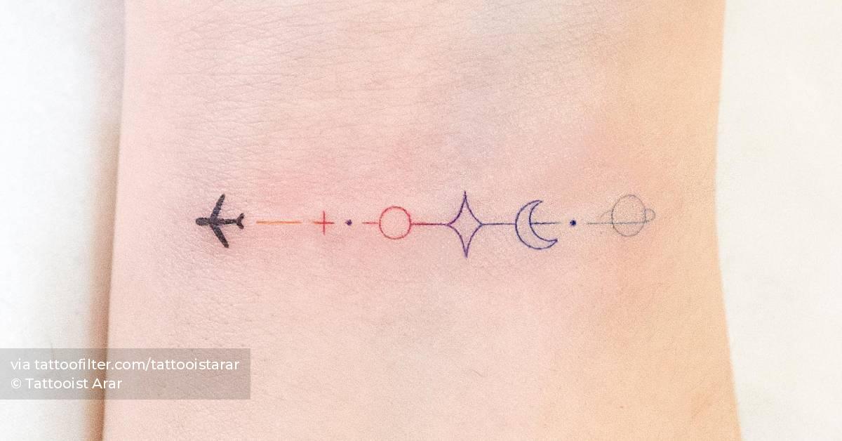 Spectrum airplane and universe tattoo located on the