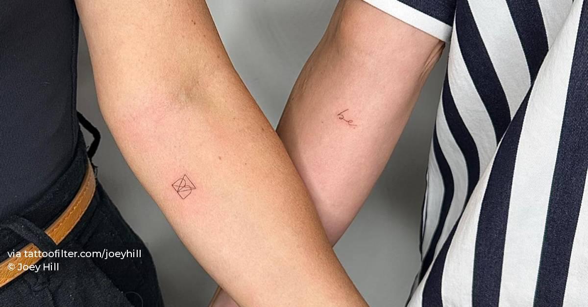 Word "be" and fine line design tattoos.