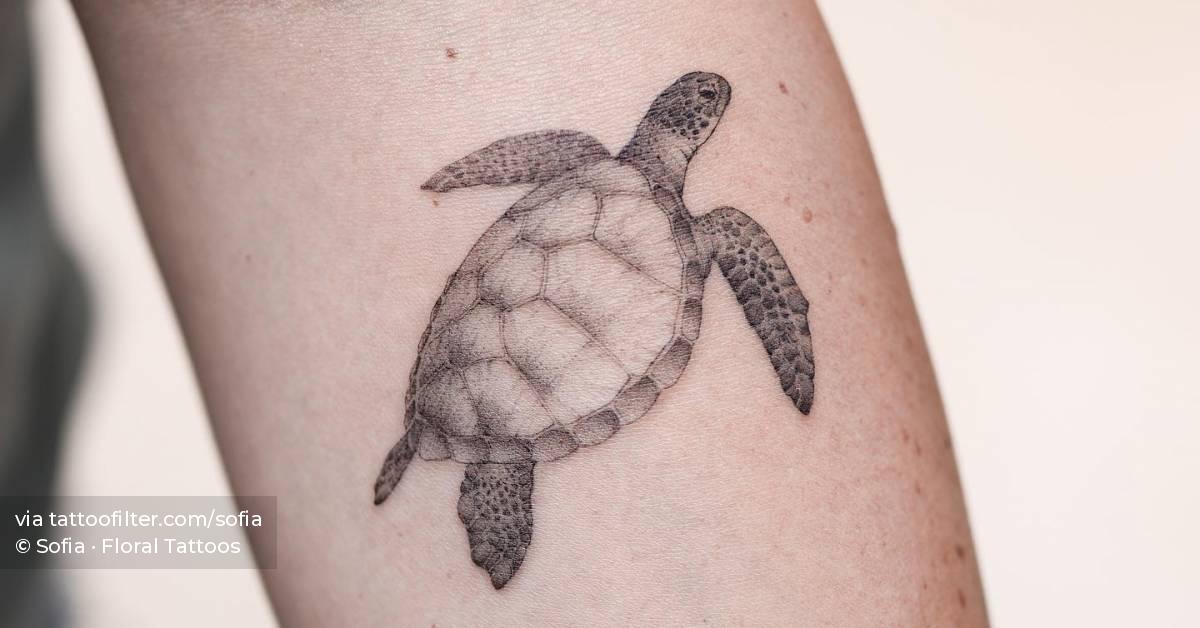 Micro-realistic style turtle tattoo located on the