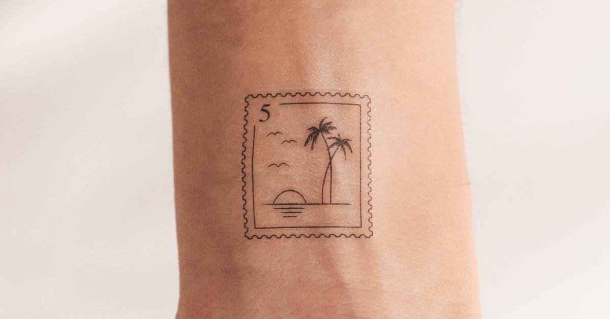 Sea sunset stamp temporary tattoo done on the wrist.