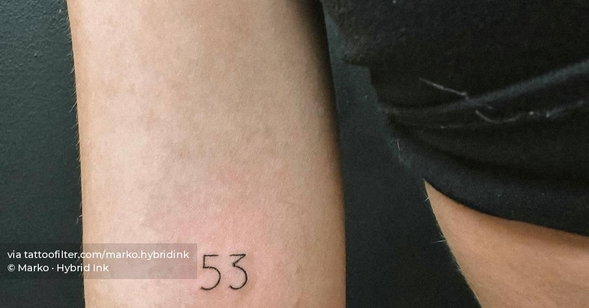 Tattoo of the number 53 located on the inner arm.