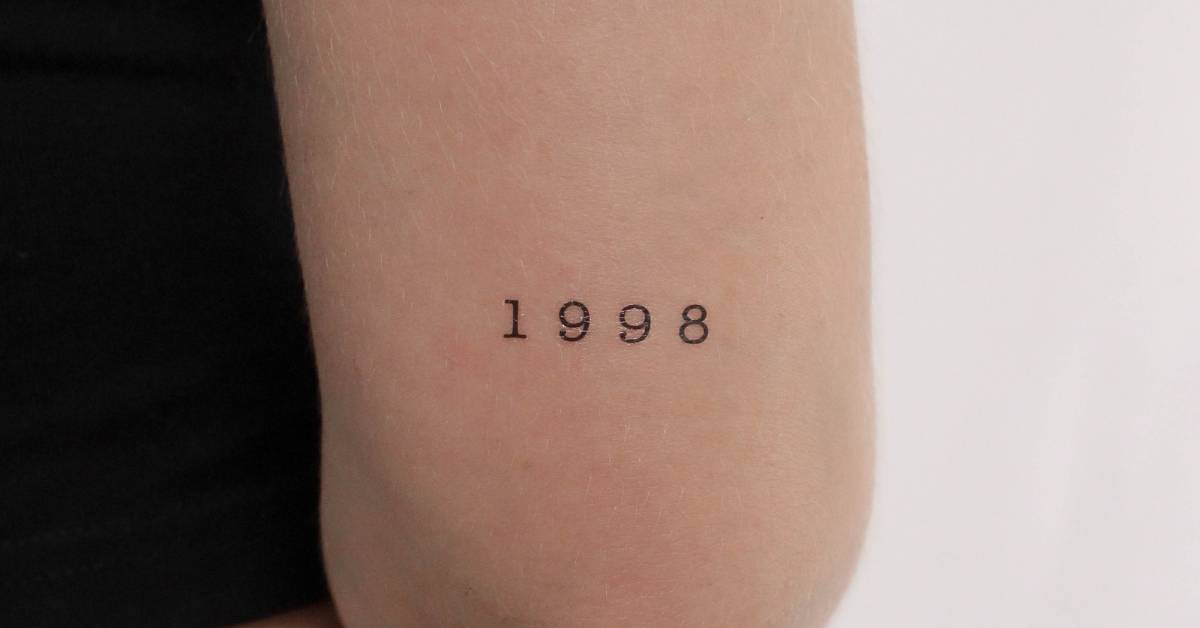 "1998" birth year temporary tattoo located on the