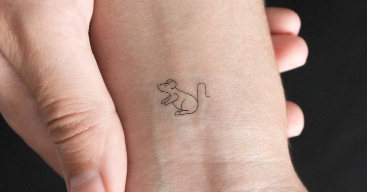 Minimalistic style rat temporary tattoo located on the