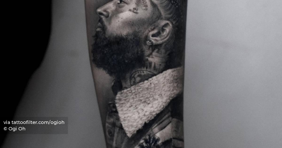 Nipsey Hussle portrait tattoo located on the inner