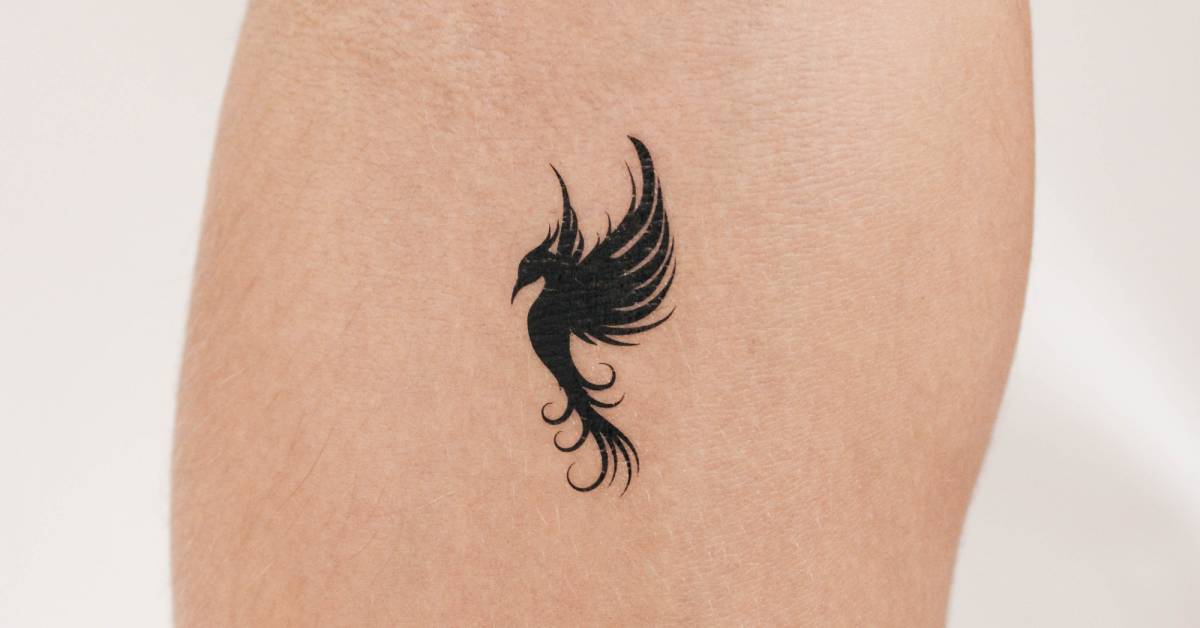 Minimalistic style phoenix temporary tattoo located on