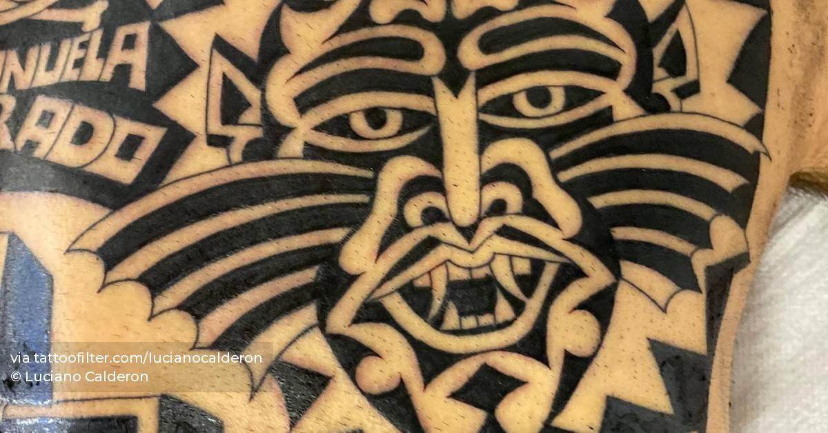 Blackwork style devil portrait tattoo located on the