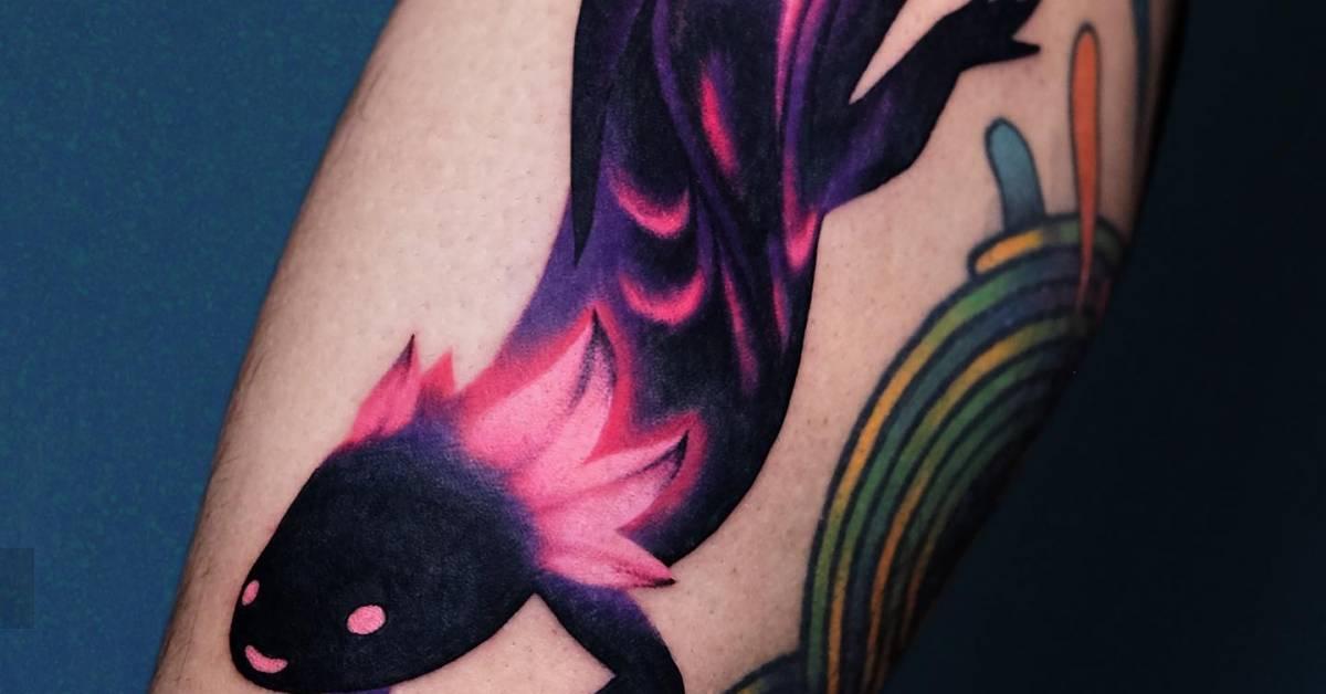 Neon Salamander tattoo located on the calf.