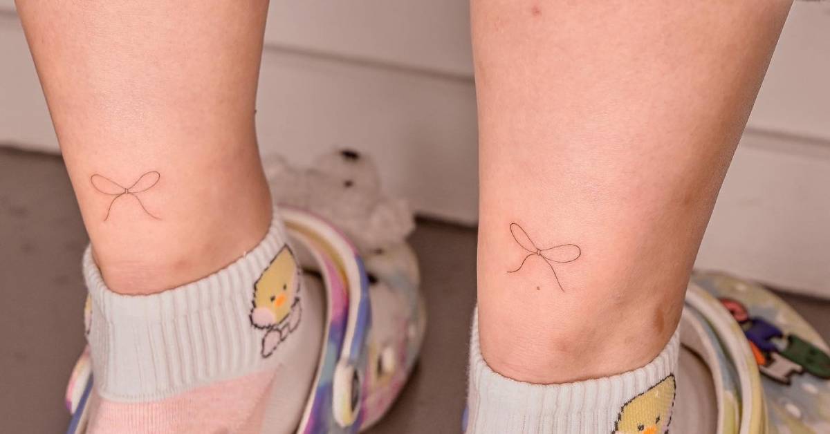 Individual matching little ribbons tattooed on the